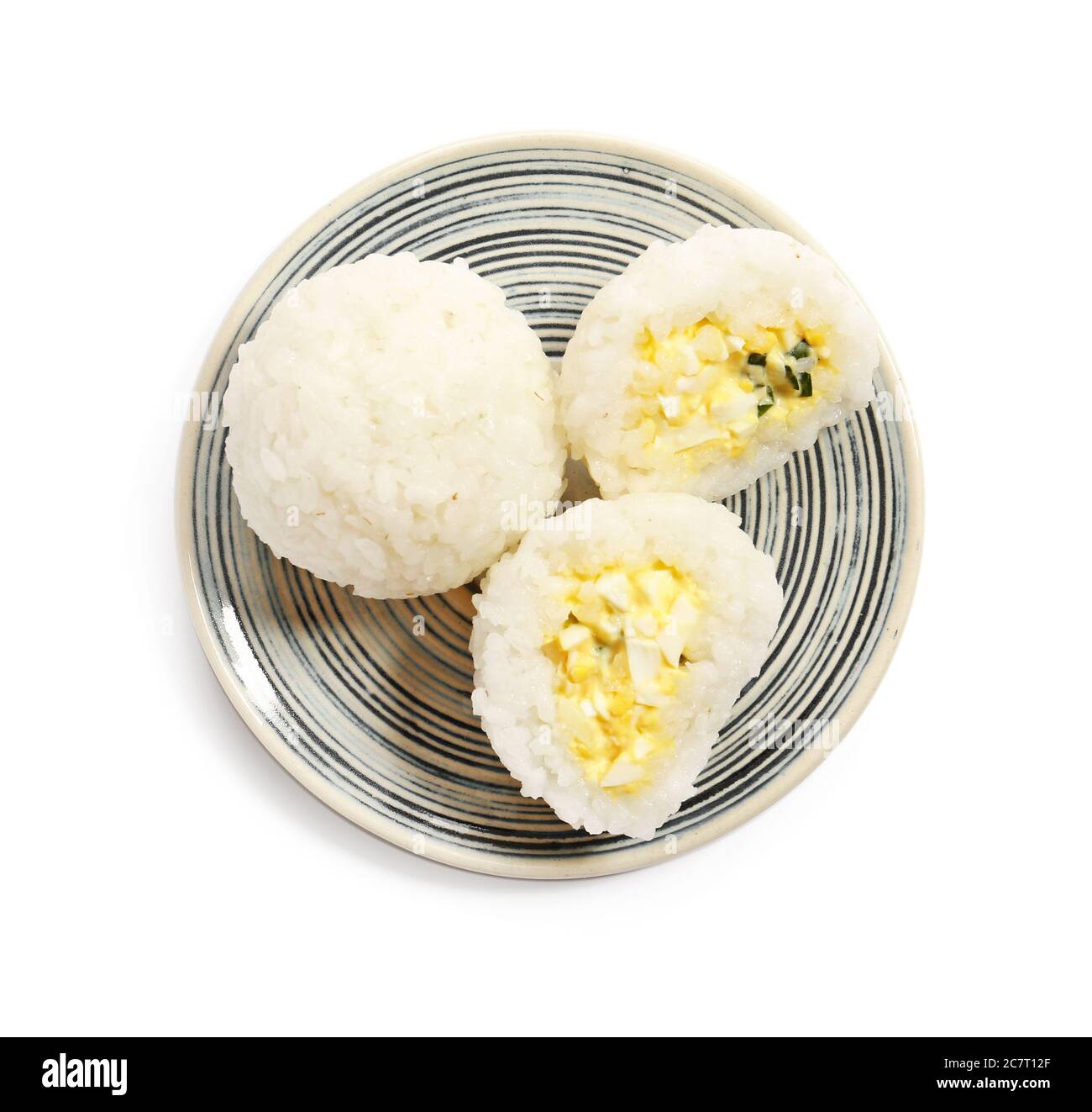 Plate with traditional Japanese onigiri on white background Stock Photo ...