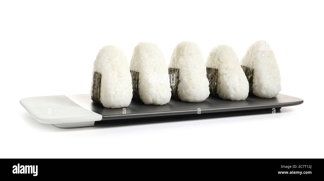 Plate with traditional Japanese onigiri on white background Stock Photo ...