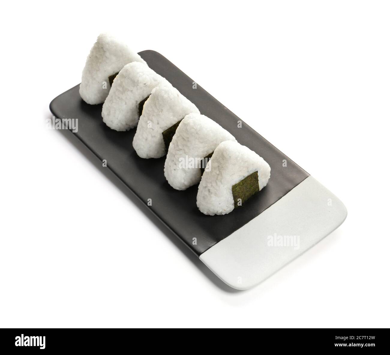 Plate with traditional Japanese onigiri on white background Stock Photo ...