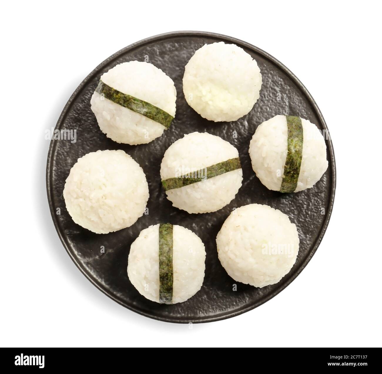 Plate with traditional Japanese onigiri on white background Stock Photo ...