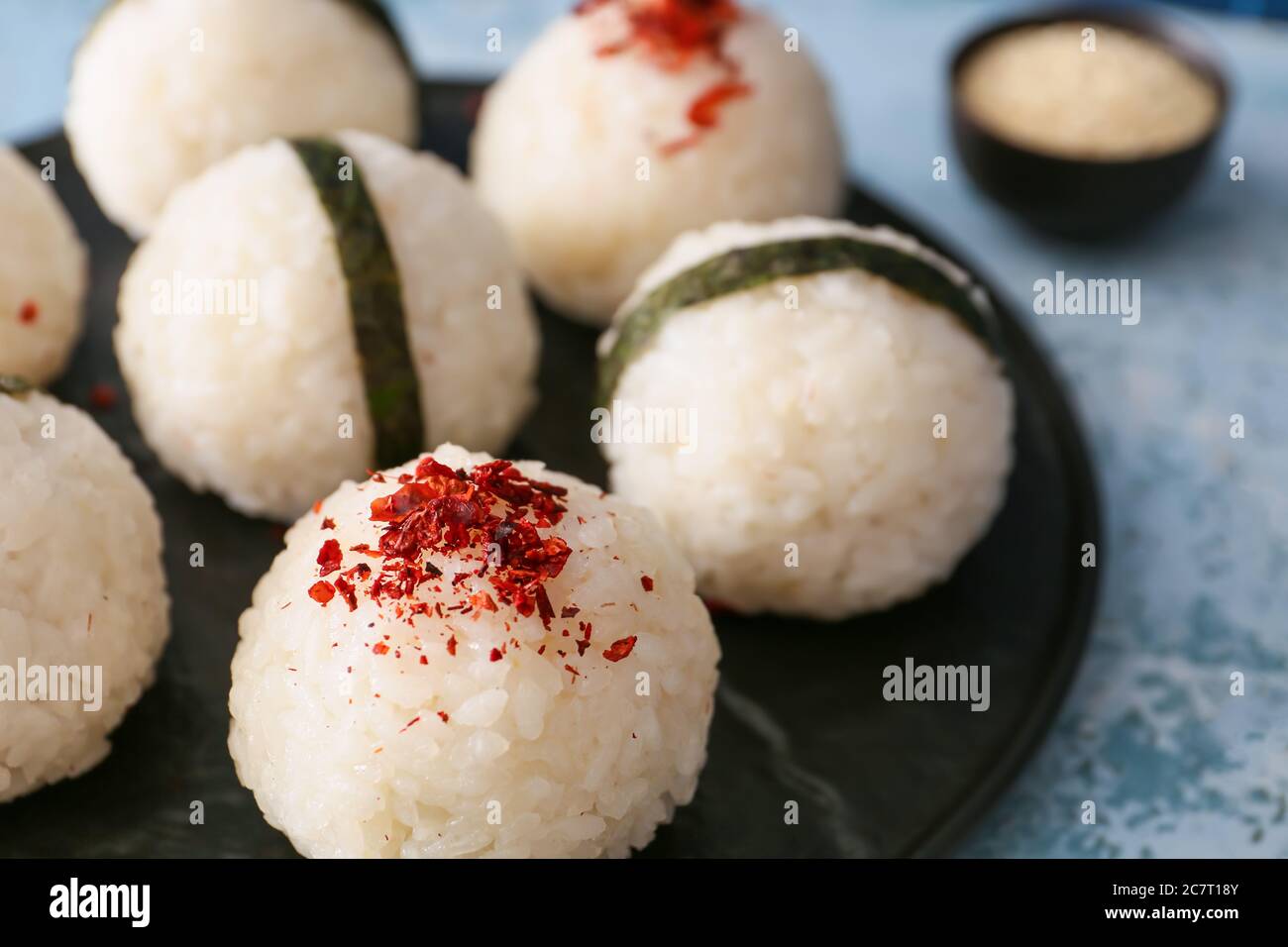 Plate with traditional Japanese onigiri with spices, closeup Stock ...