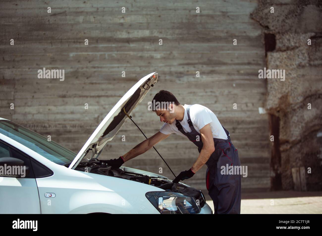 Car Mechanic Looks High Resolution Stock Photography and Images - Alamy