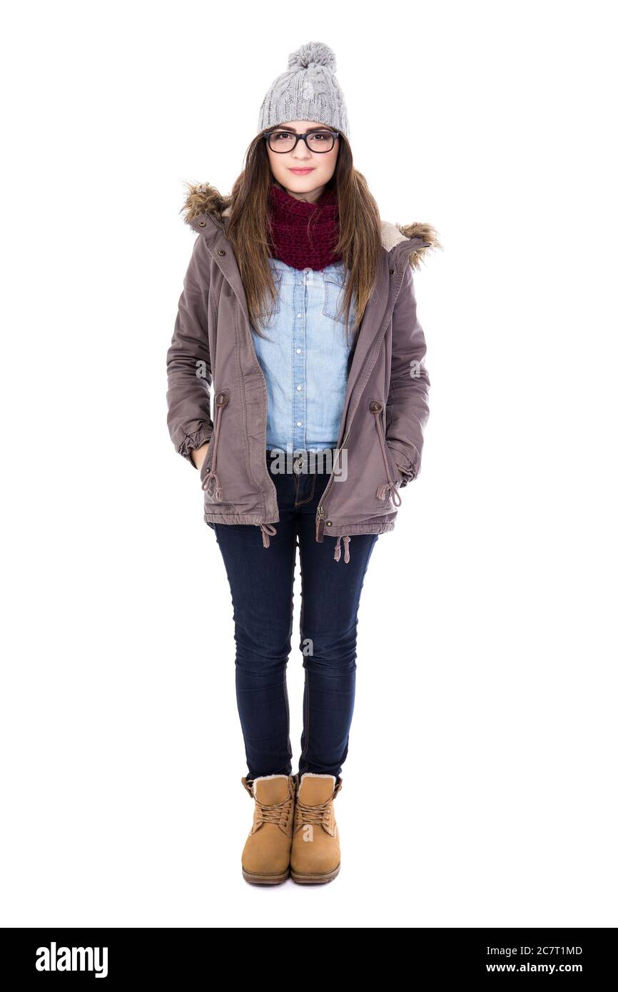 full length portrait of young woman in winter clothes isolated on white ...