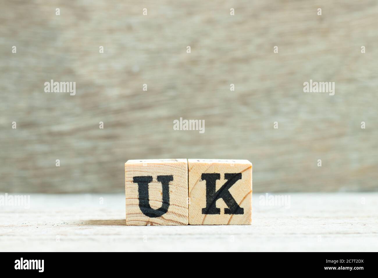 Alphabet letter in word UK (abbreviation of united kingdom) on wood ...