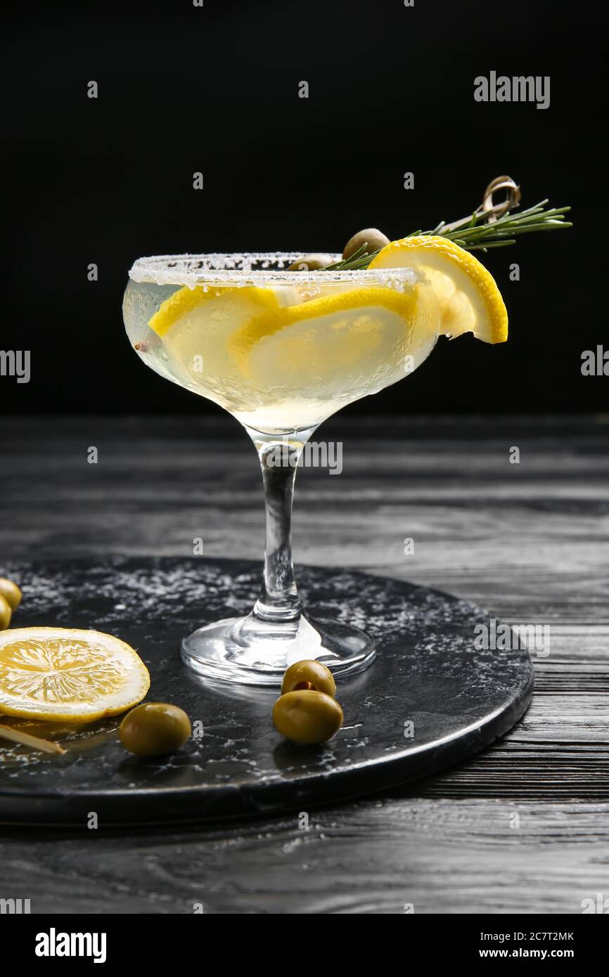 Glass of tasty martini cocktail on table Stock Photo - Alamy