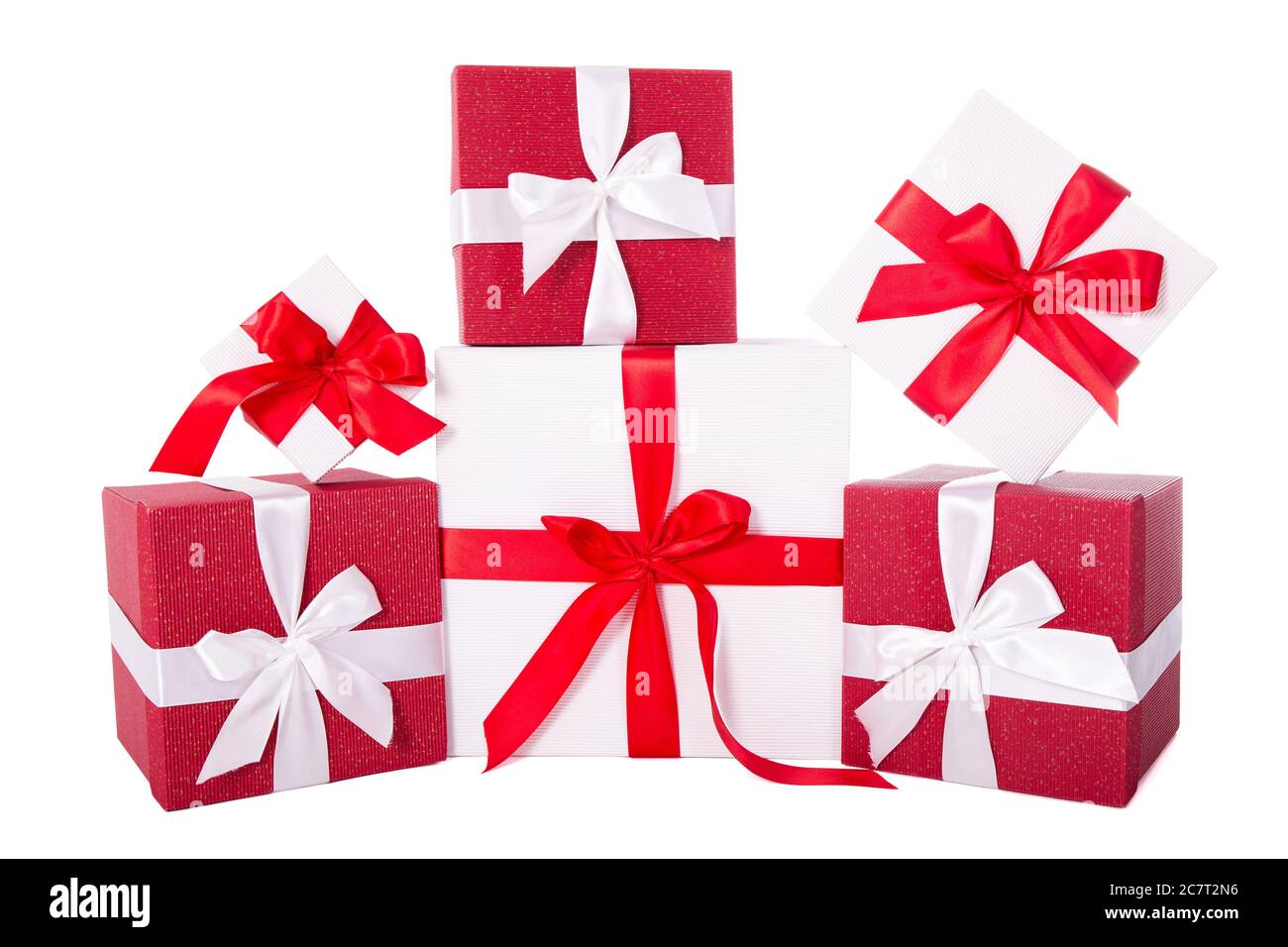 Birthday or Christmas concept - red and white gift boxes isolated on ...