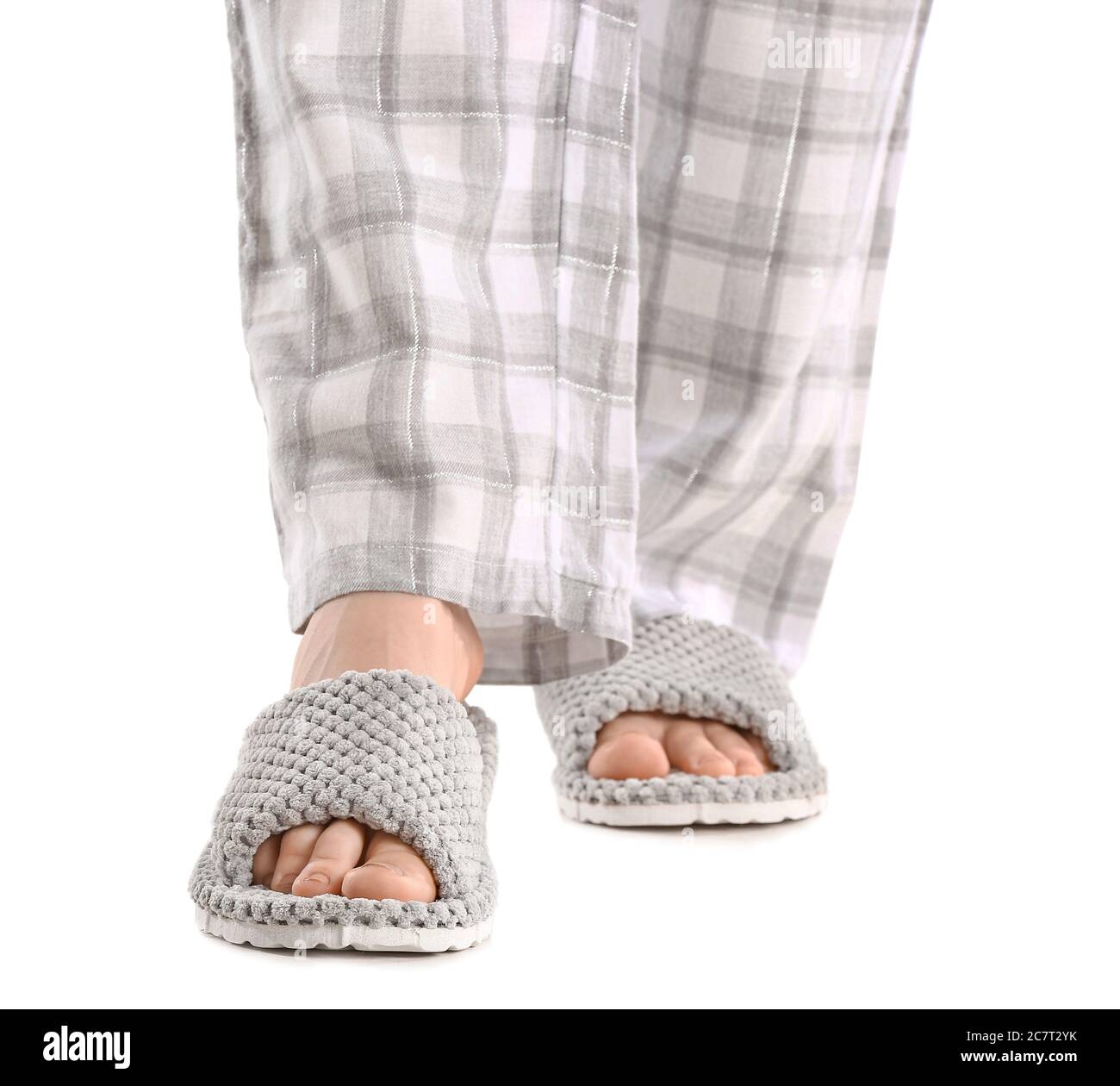 Woman wearing white fluffy slippers hi-res stock photography and images ...