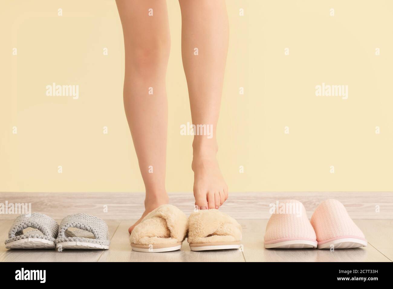 Putting on slippers hi-res stock photography and images - Alamy