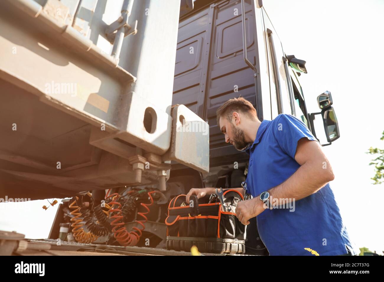 Person repairing transportation truck hi-res stock photography and ...