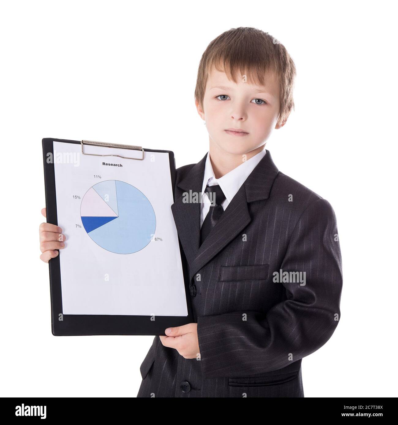 business concept - little boy in business suit showing results of ...