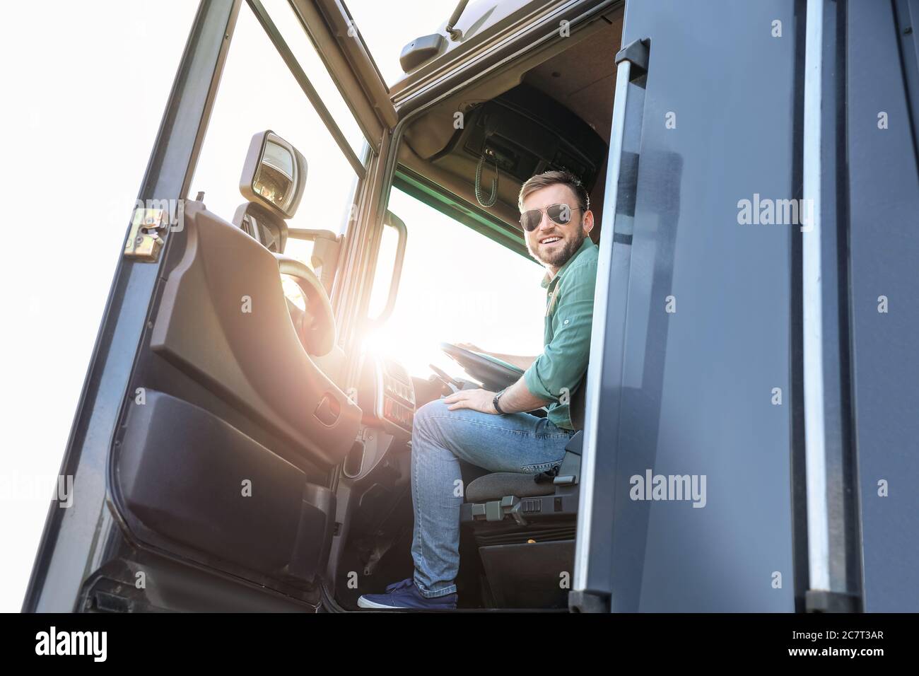 Handsome young truck driver hi-res stock photography and images - Alamy