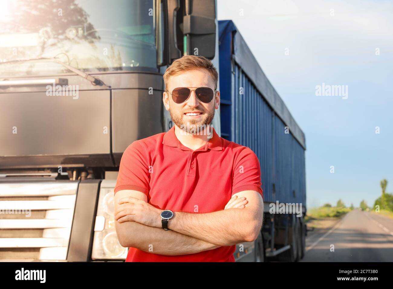 Male driver near big truck outdoors Stock Photo - Alamy