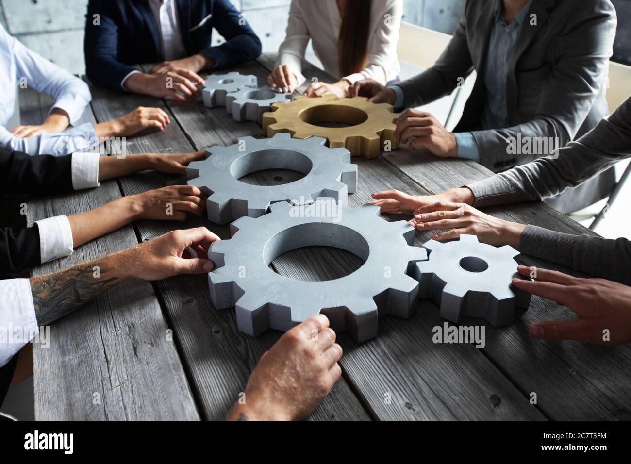 Business people teamwork gear together hi-res stock photography and ...
