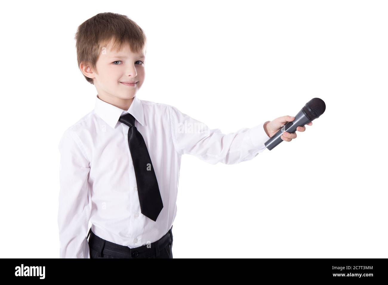 cute little boy in business suit with microphone taking interview ...