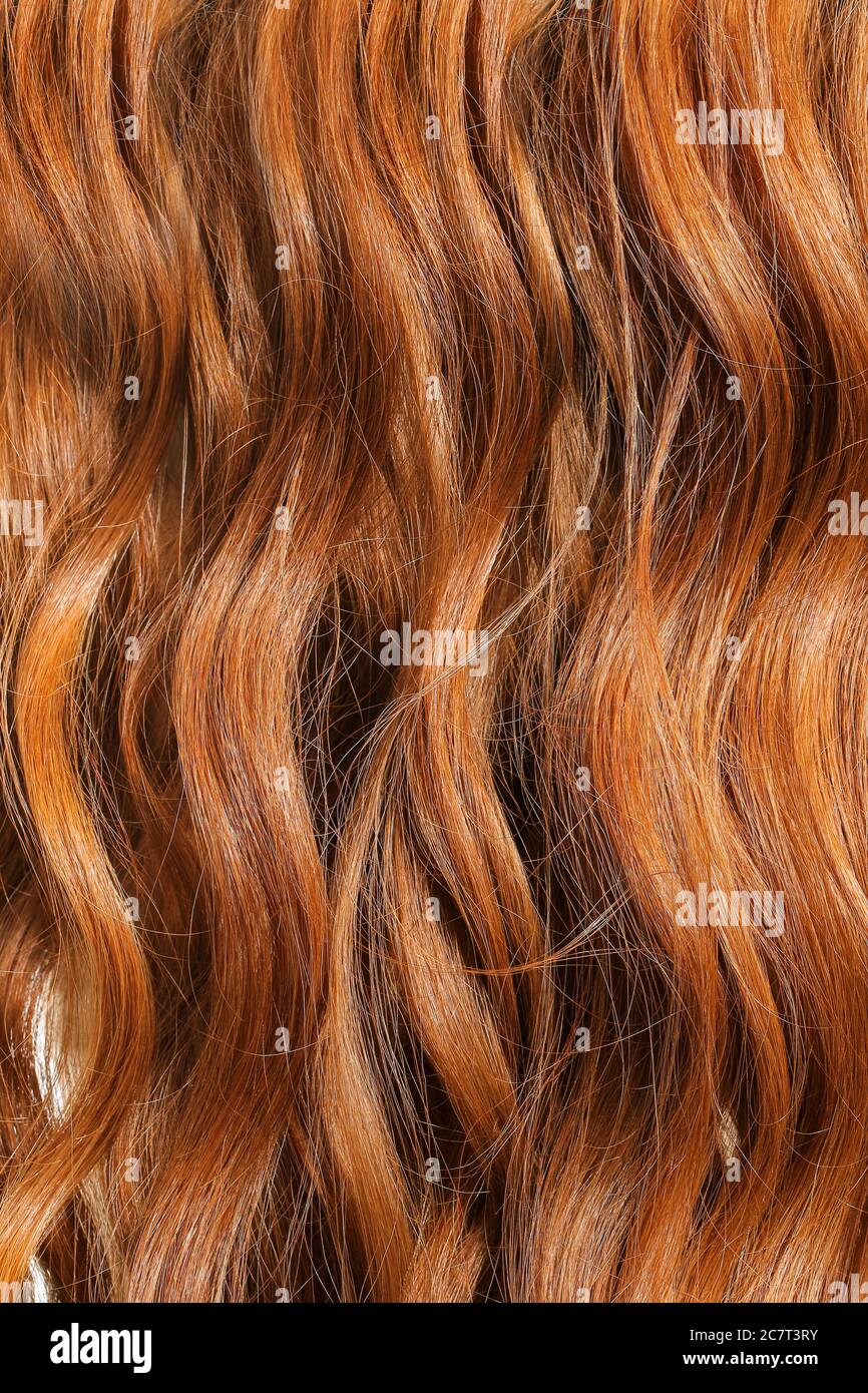 Curly red hair as background Stock Photo - Alamy