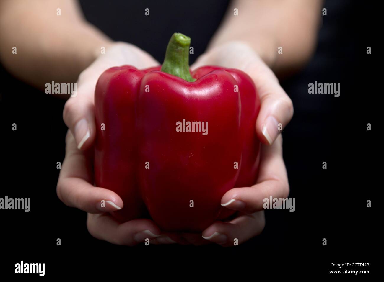 Hand red sweet pepper hi-res stock photography and images - Alamy