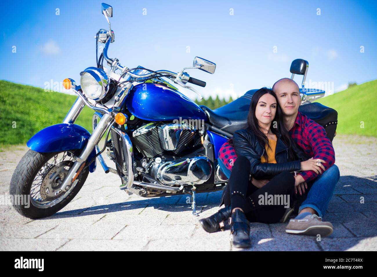 Fashion couple sitting on motorcycle hi-res stock photography and ...