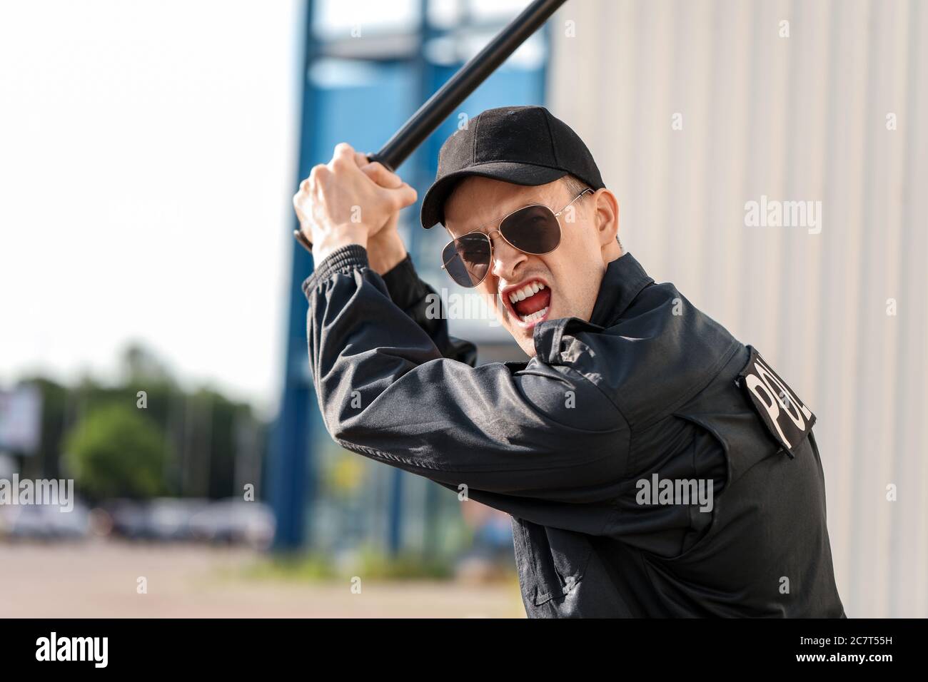 Police officer with baton hi-res stock photography and images - Alamy