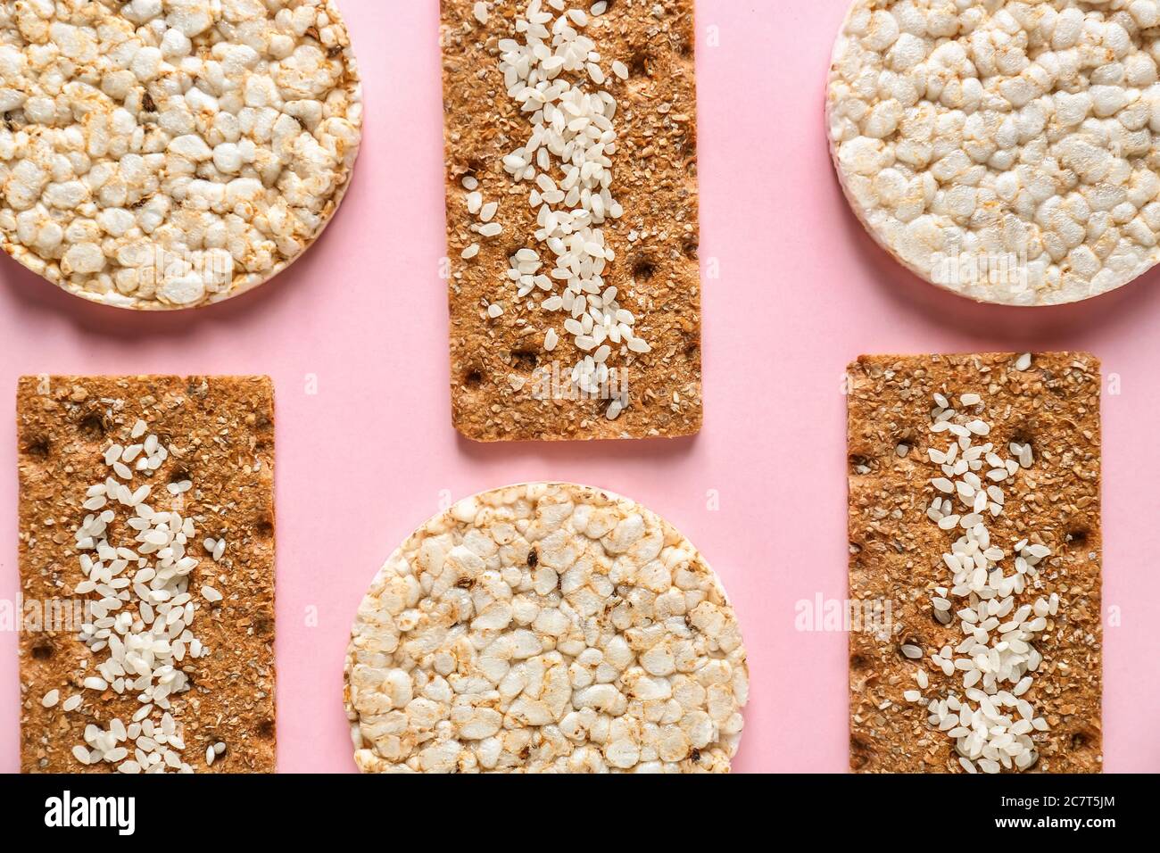 Healthy crispbreads on color background Stock Photo - Alamy