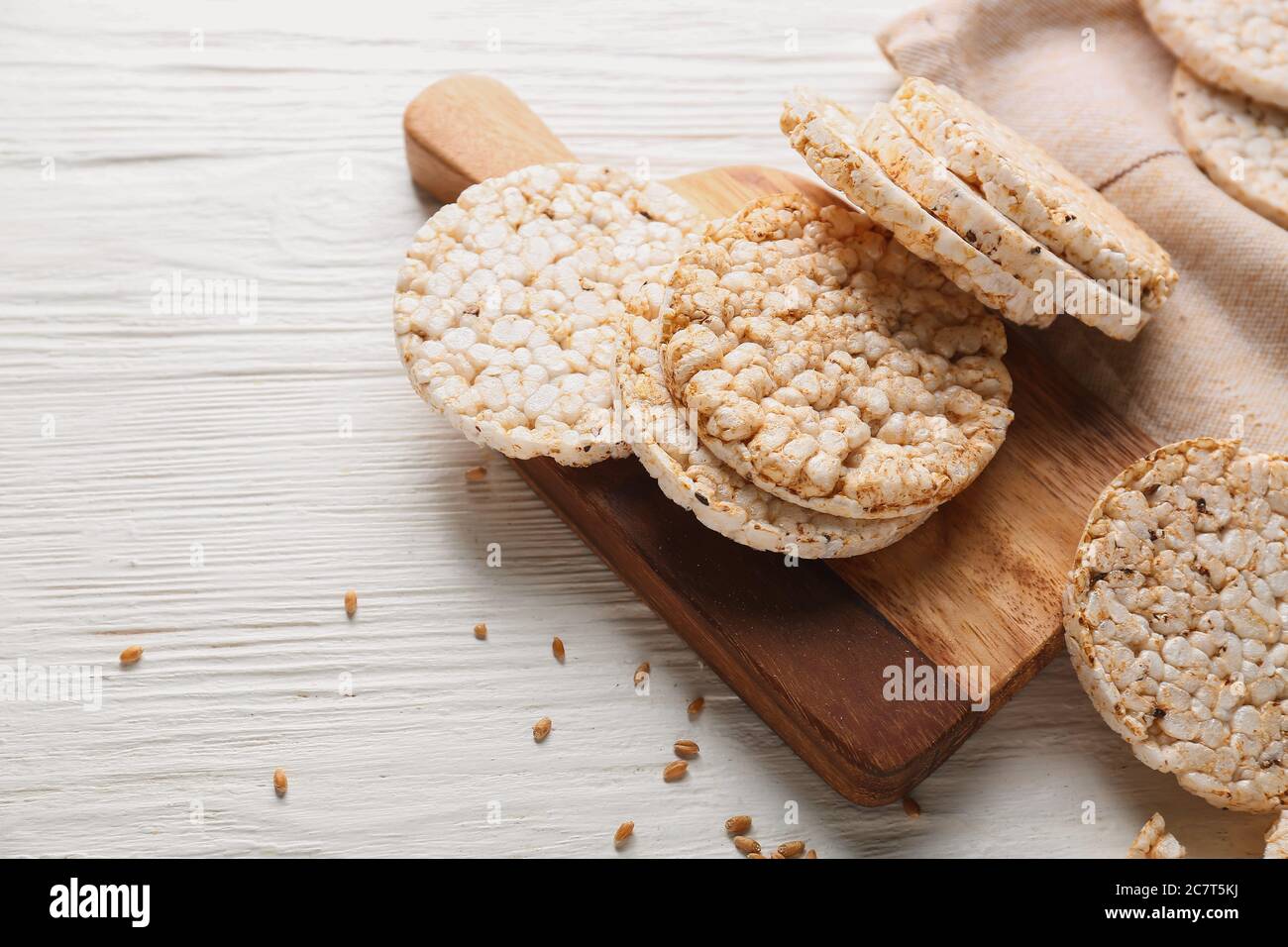Rice crispbreads on white table Stock Photo - Alamy