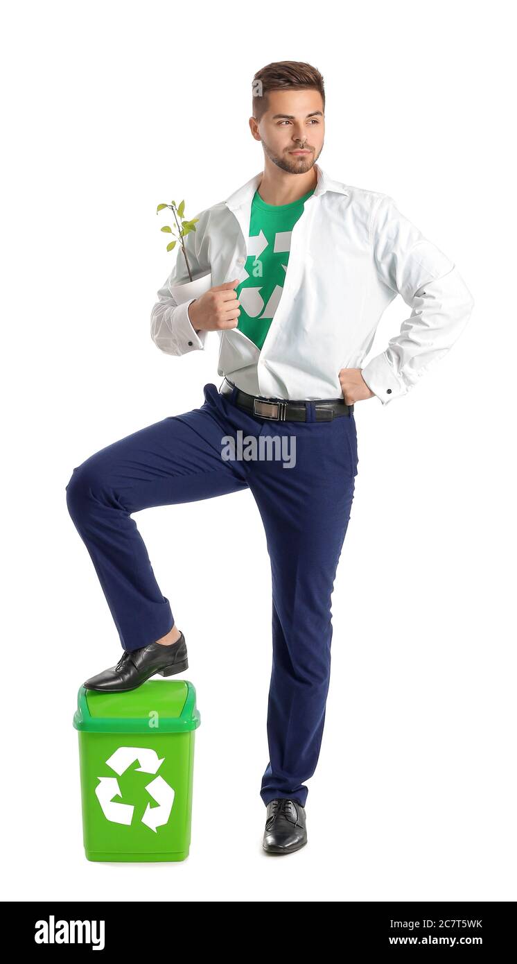 Man in t-shirt with recycling sign, plant and trash bin on white ...
