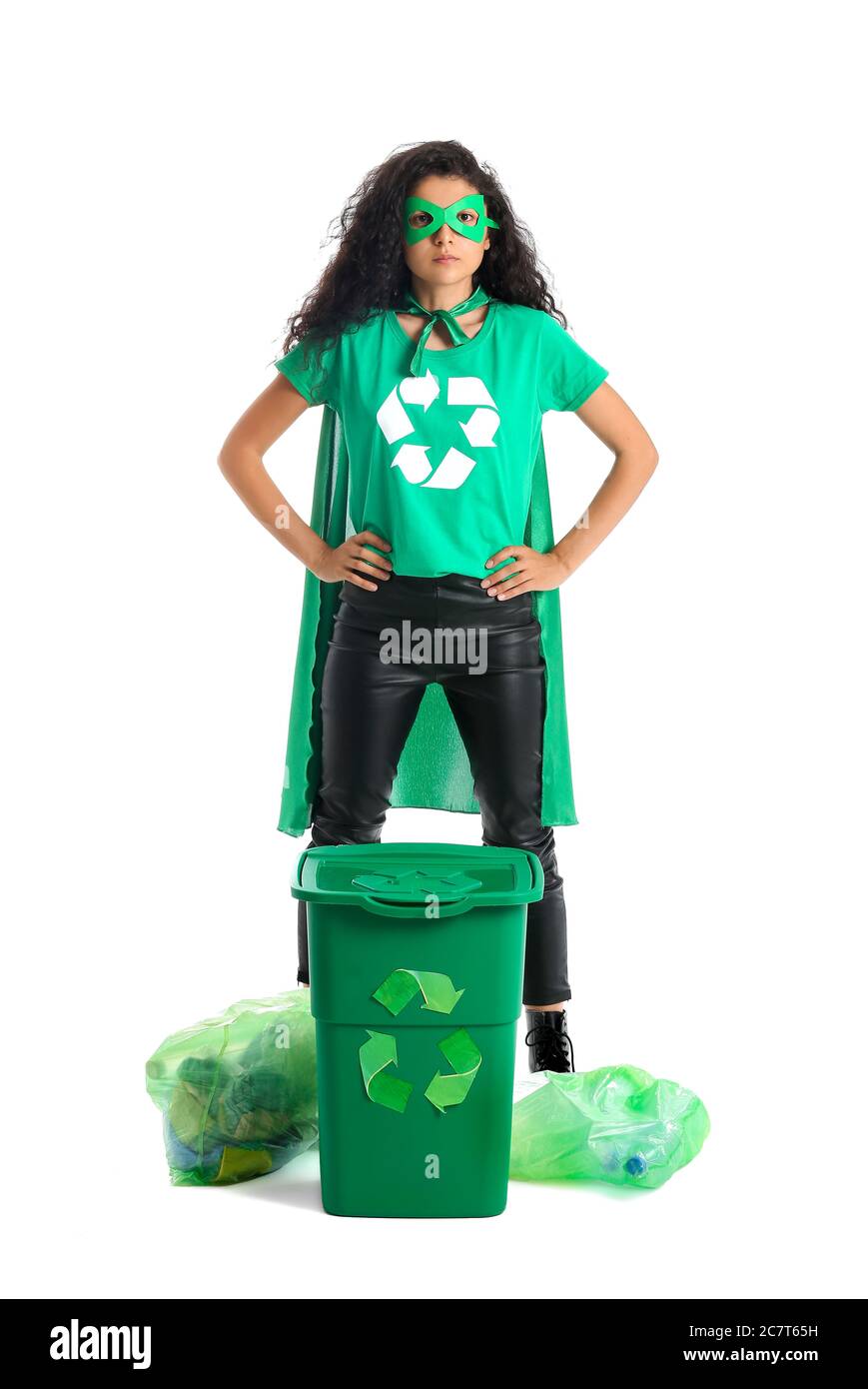 Woman dressed as eco superhero with trash on white background Stock ...