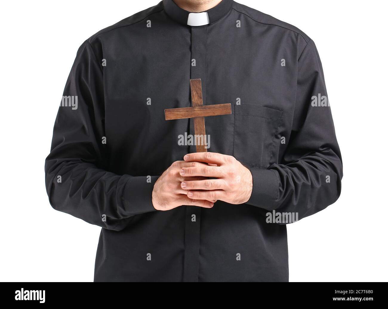 Young priest with cross on white background Stock Photo - Alamy
