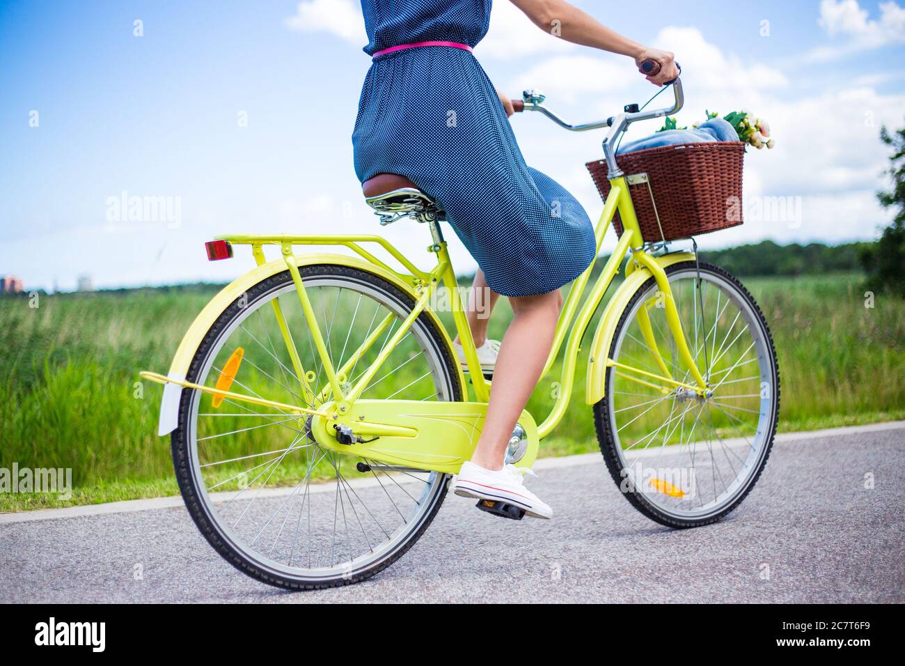 One woman cycling summer side view hi-res stock photography and images ...