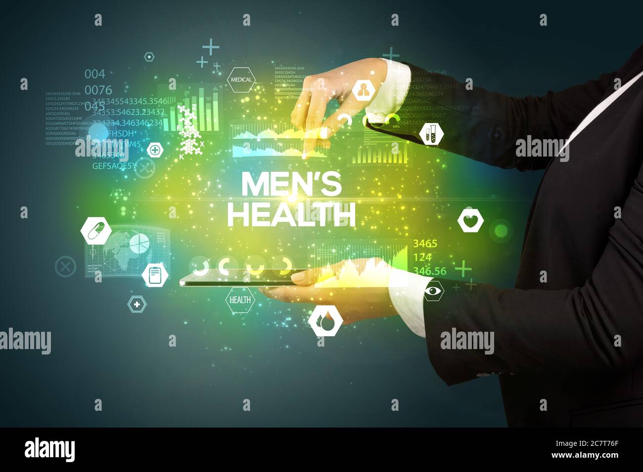 Close-up of a touchscreen with MEN’S HEALTH inscription, medical ...