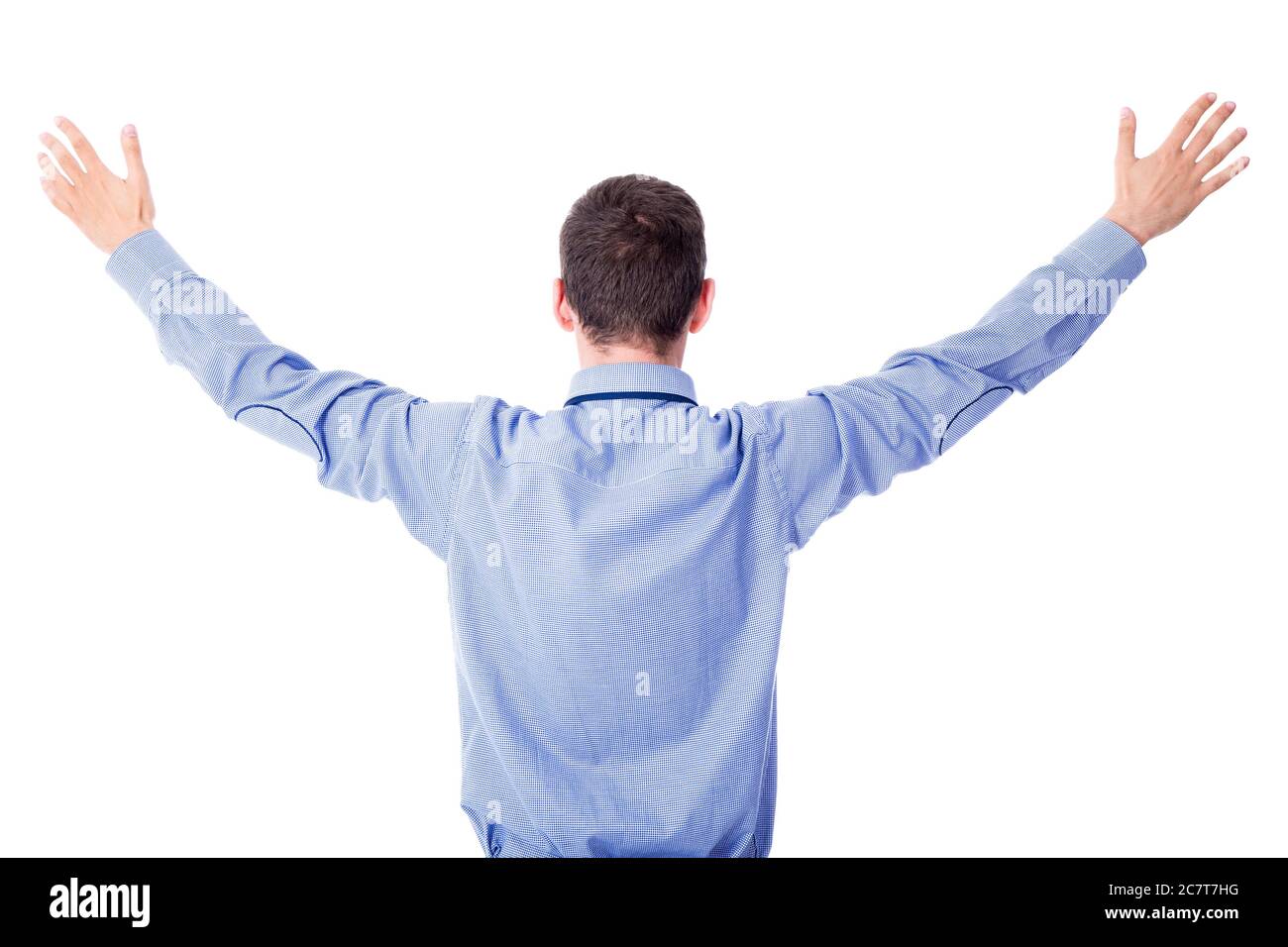 back view of cheerful young businessman holding hands up isolated on ...
