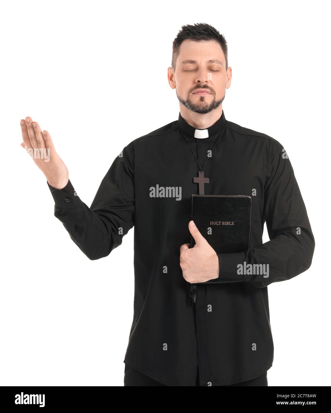 Handsome priest on white background Stock Photo - Alamy