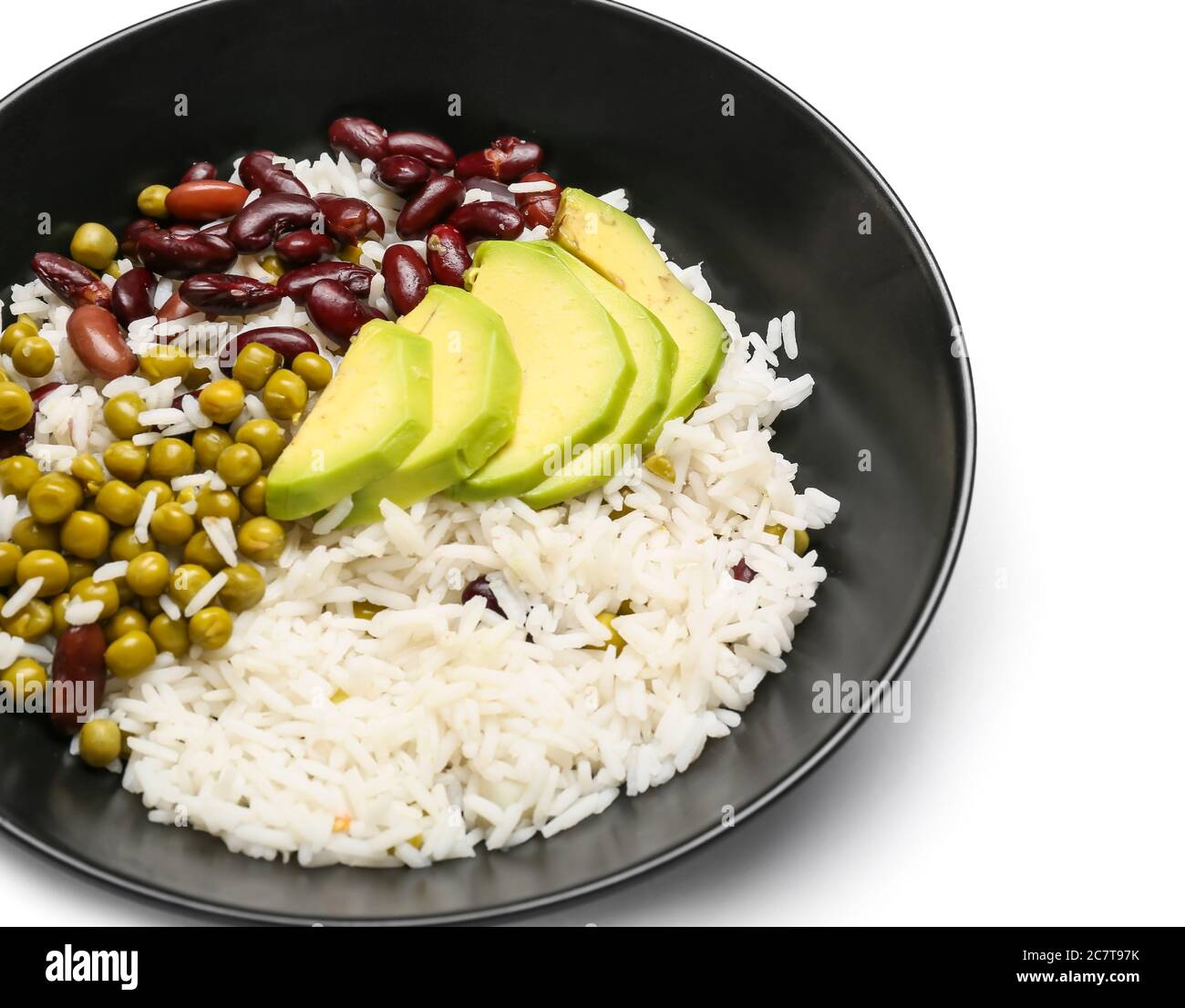 Bowl with tasty rice, beans and avocado on white background Stock Photo ...