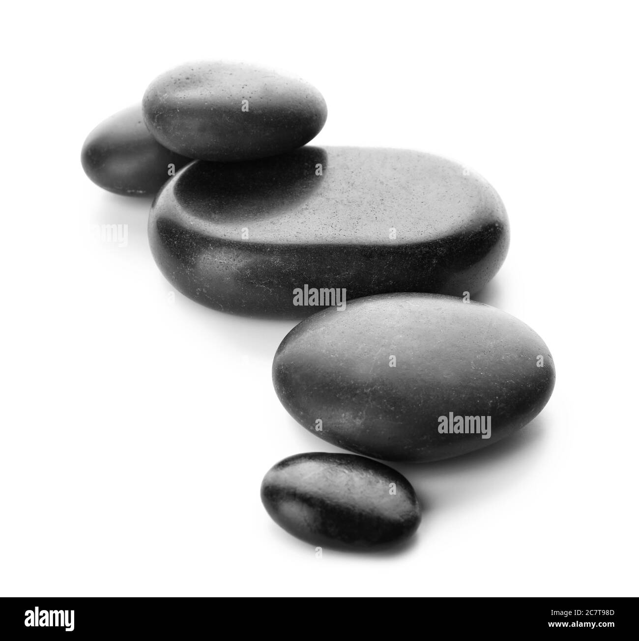 Spa stones on white background Stock Photo - Alamy