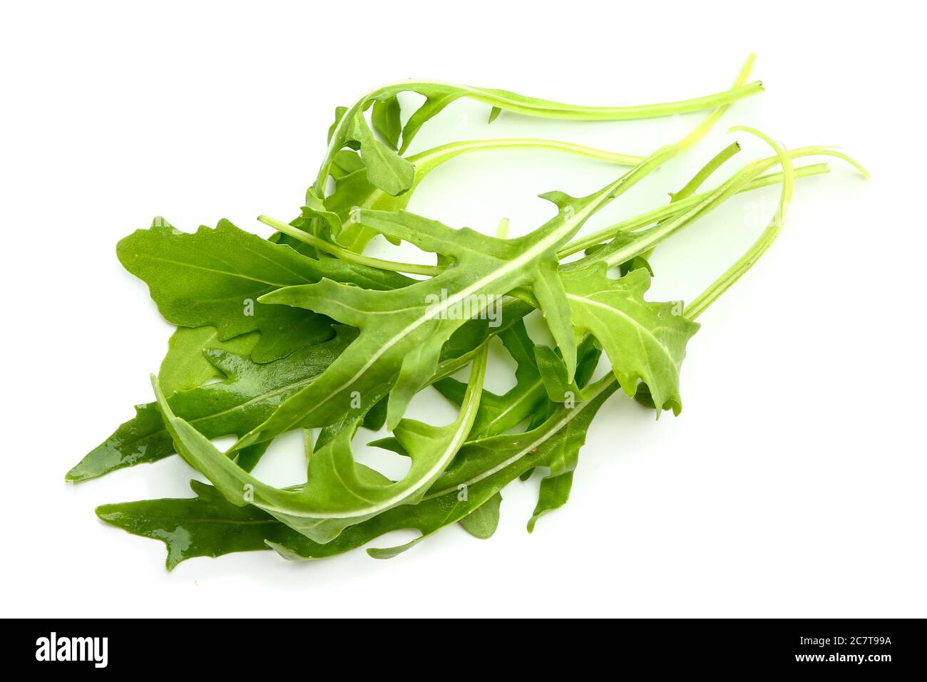 Fresh arugula on white background Stock Photo - Alamy