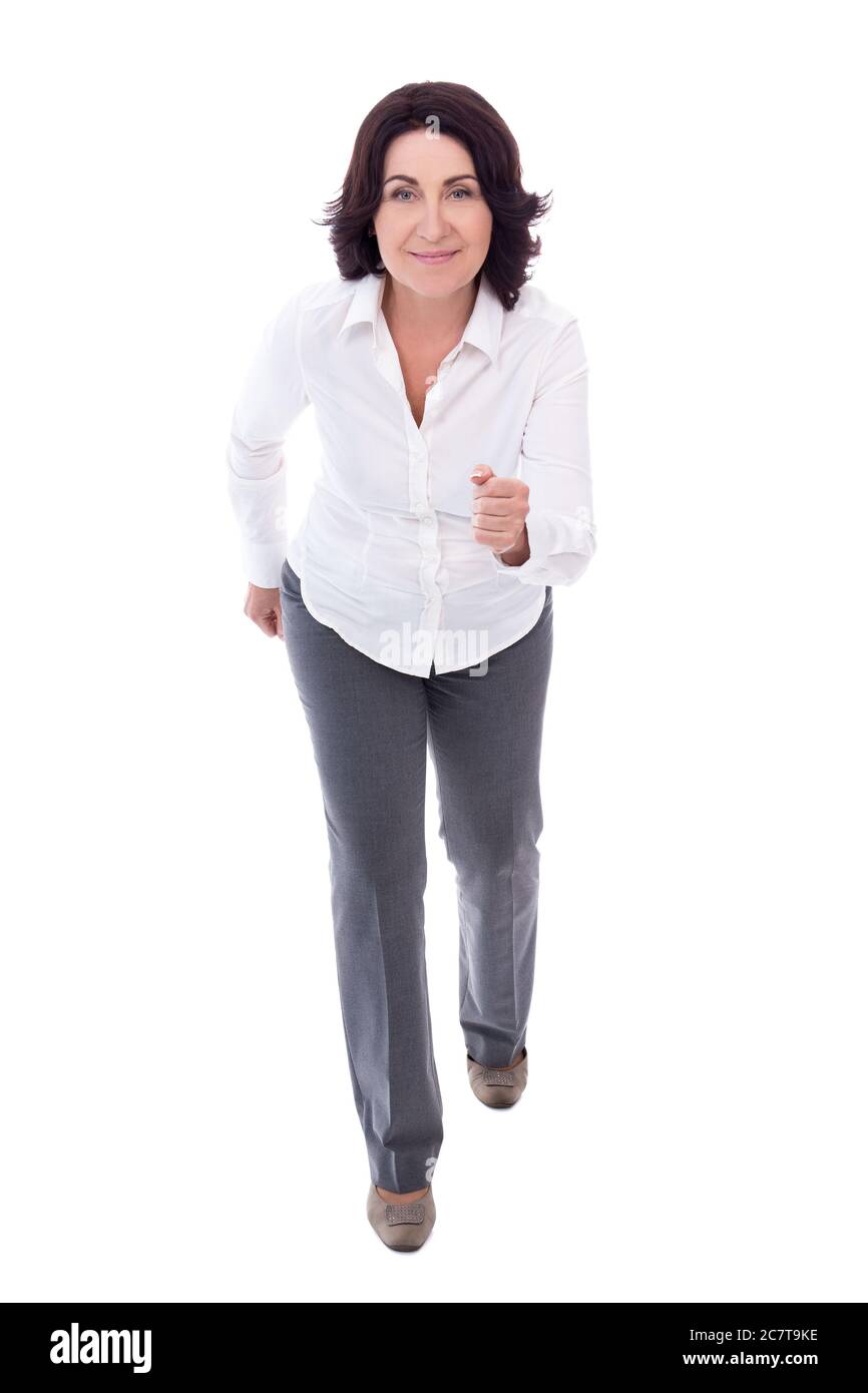 front view of mature woman running isolated on white background Stock ...