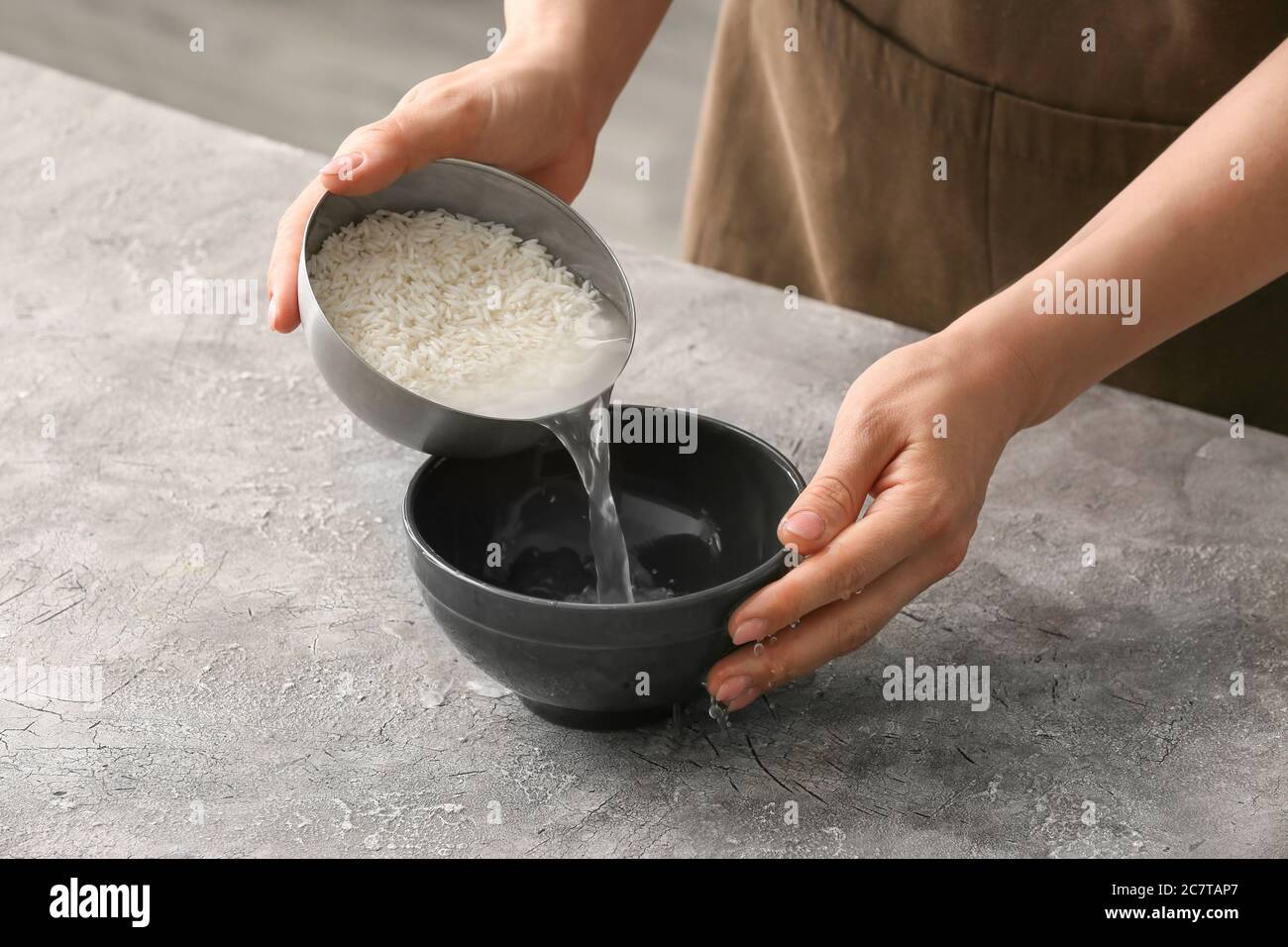 Person pouring water infused hi-res stock photography and images - Alamy