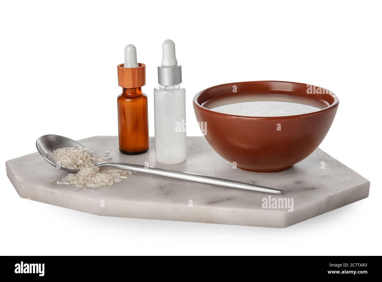 Healthy rice water on white background Stock Photo - Alamy