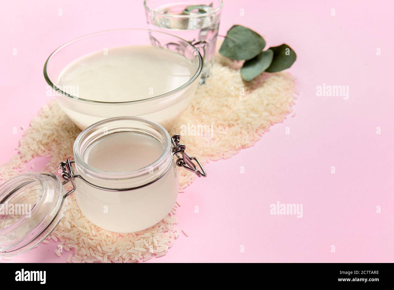 Healthy rice water on color background Stock Photo - Alamy