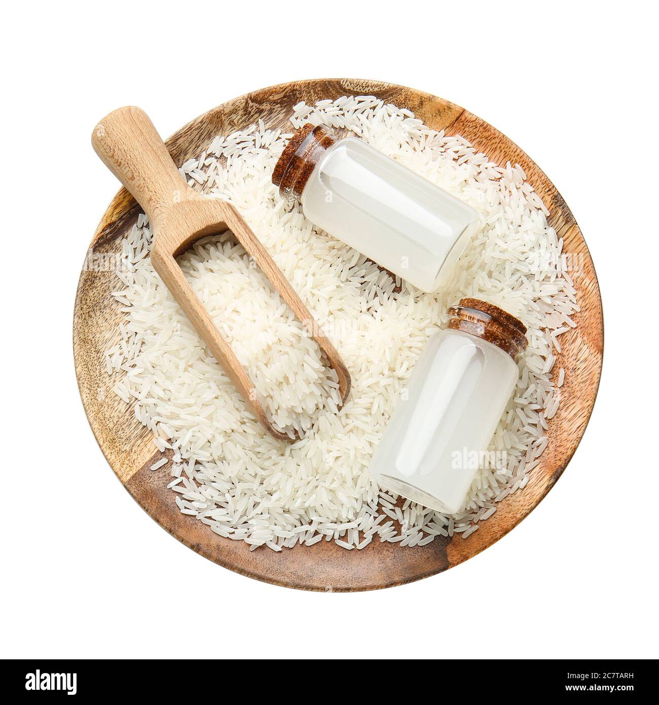 Bottles of rice water on white background Stock Photo - Alamy