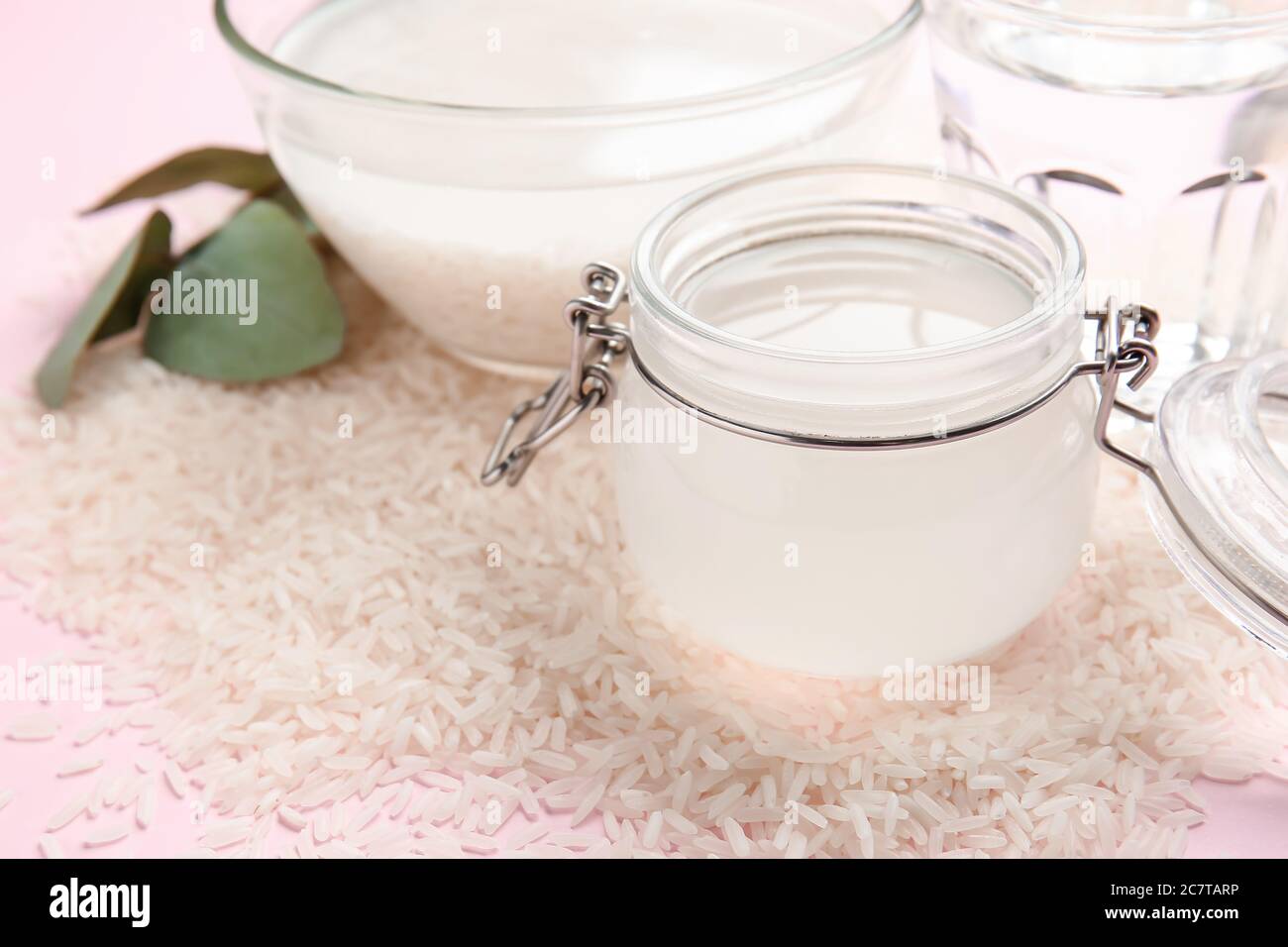 Healthy rice water on color background Stock Photo - Alamy