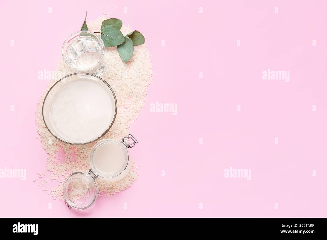 Healthy rice water on color background Stock Photo - Alamy