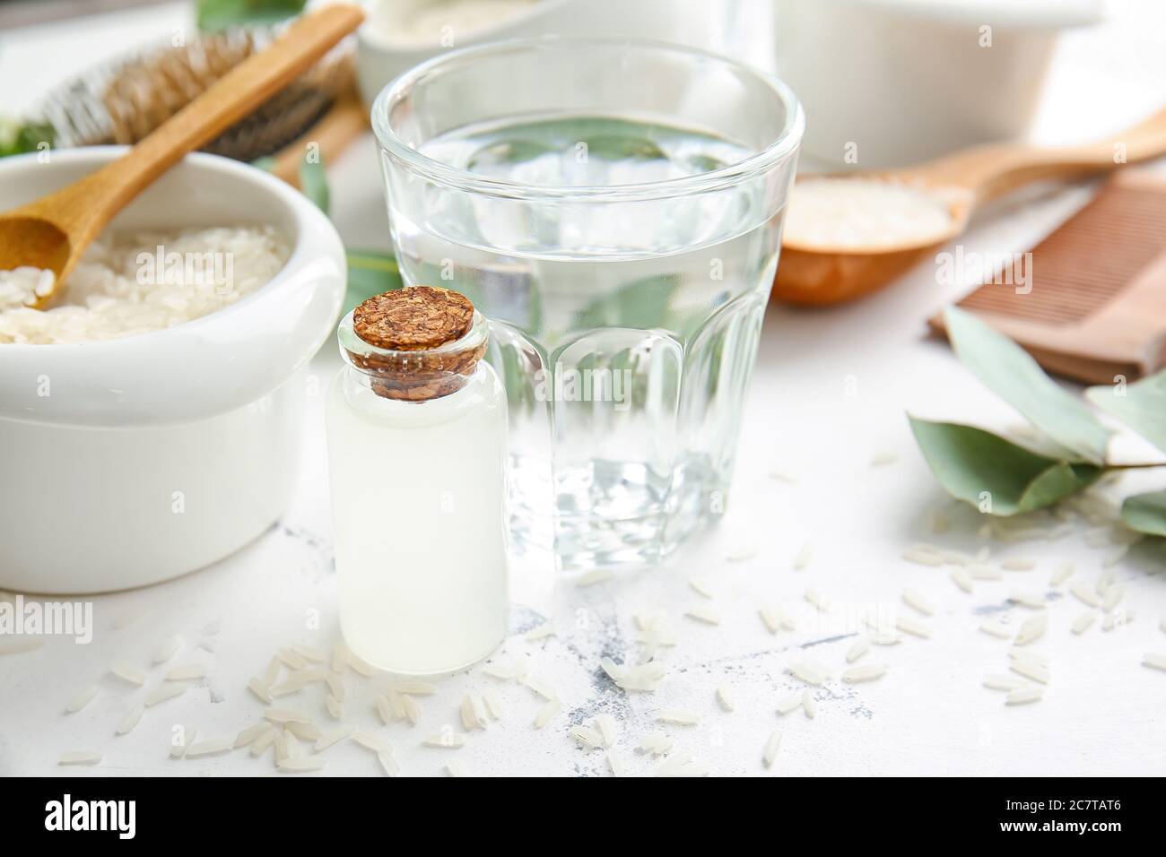 Bottle of rice water on white background Stock Photo - Alamy