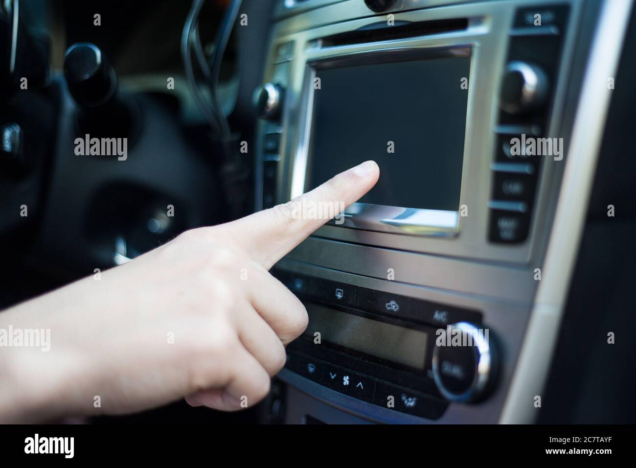 male hand touching blank screen in modern car Stock Photo - Alamy