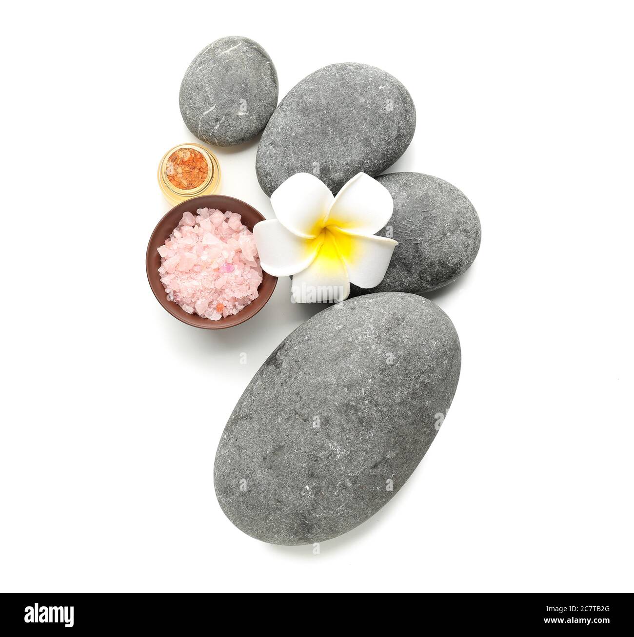Spa stones and sea salt on white background Stock Photo - Alamy