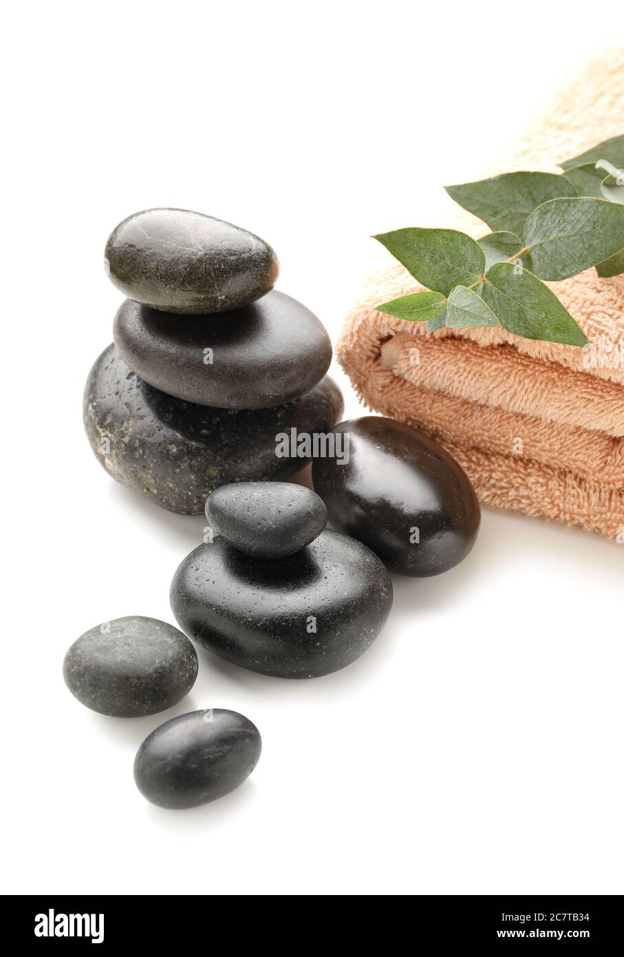 Composition with spa stones on white background Stock Photo - Alamy