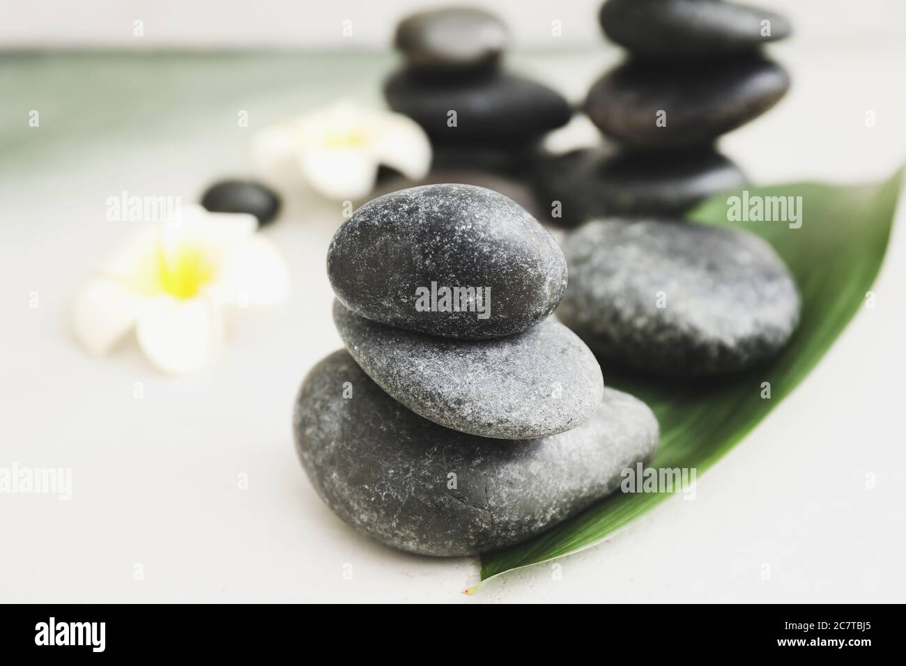 Spa stones on light background Stock Photo - Alamy