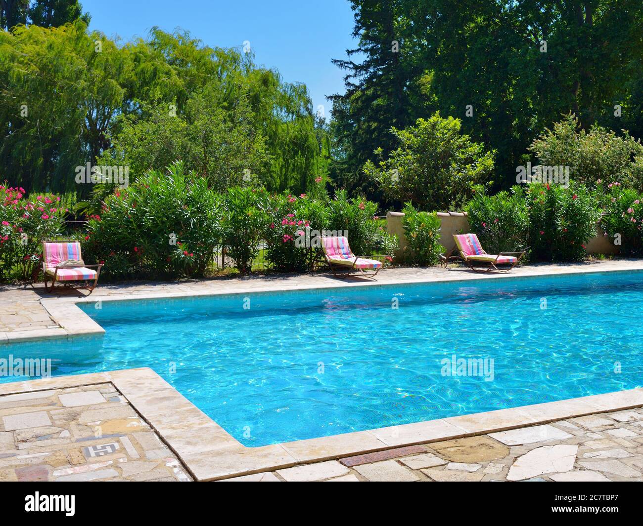 Pool with blue water in rural region of Provence, France Stock Photo ...