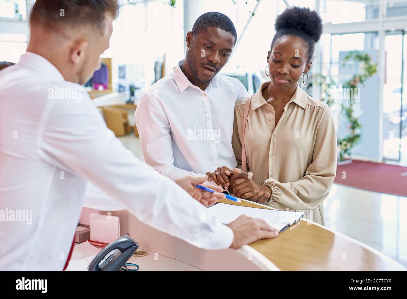 Manager welcomes new employee hi-res stock photography and images - Alamy