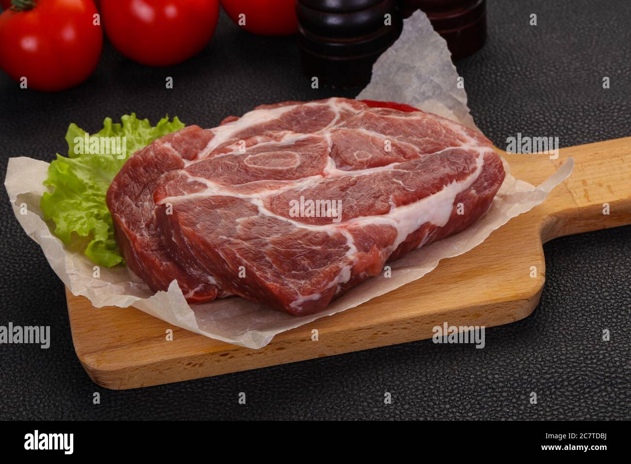 Raw pork neck steak ready for cooking Stock Photo - Alamy
