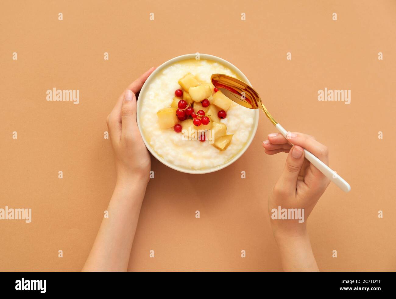 Woman eating brown rice hi-res stock photography and images - Alamy